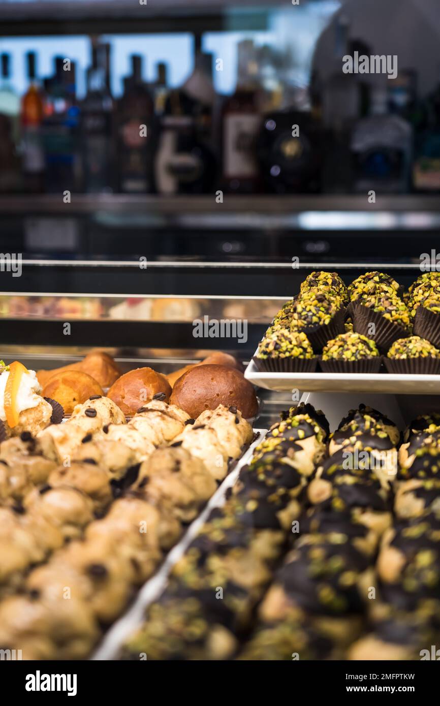 Italian Bakery counter, Window of desserts at a pastry shop. Fresh and ...