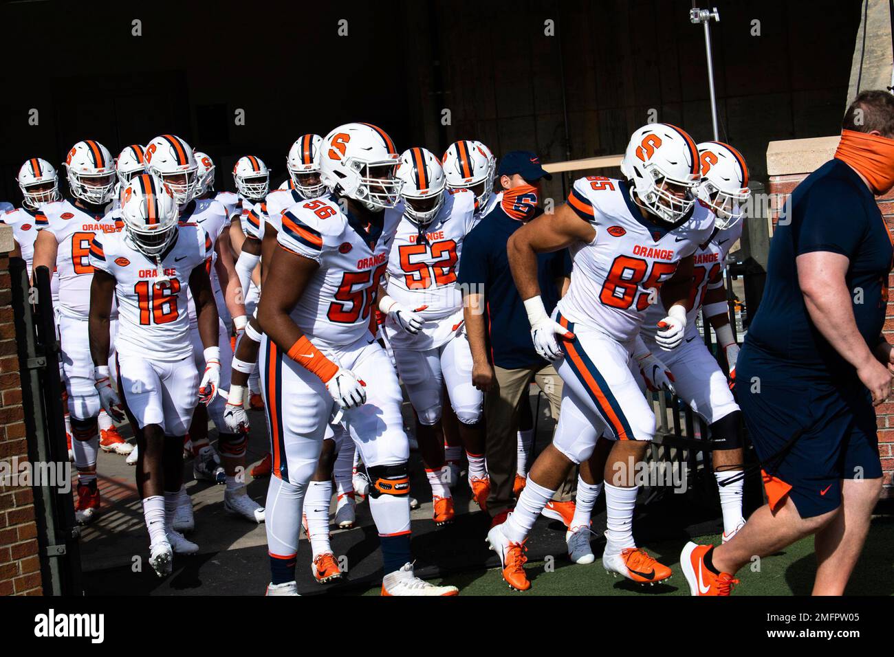 Syracuse takes the field to warm up before their game against Clemson ...
