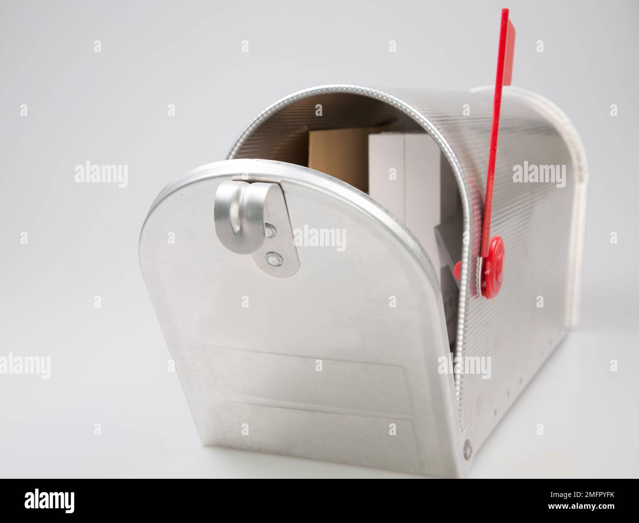 Open silver mail box with envelope on the cover isolated grey ...