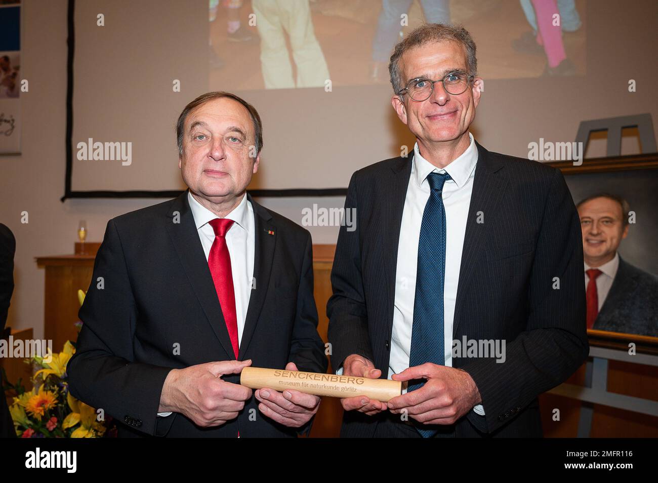 25 January 2023, Saxony, Görlitz: Willi Xylander (l) passes the baton ...