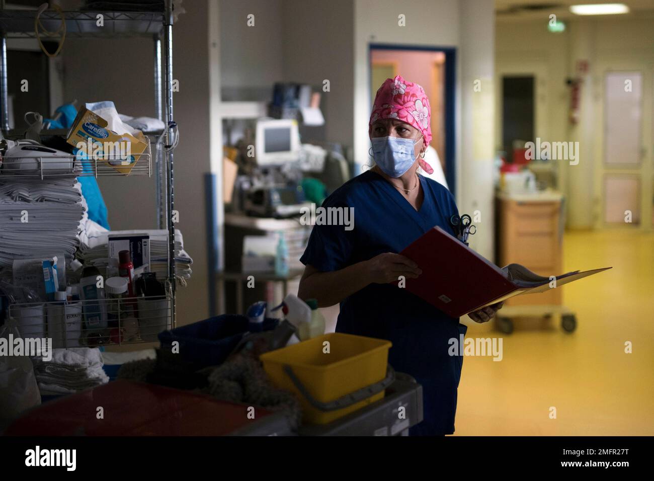 A healthcare worker is pictured in the intensive care unit at the ...