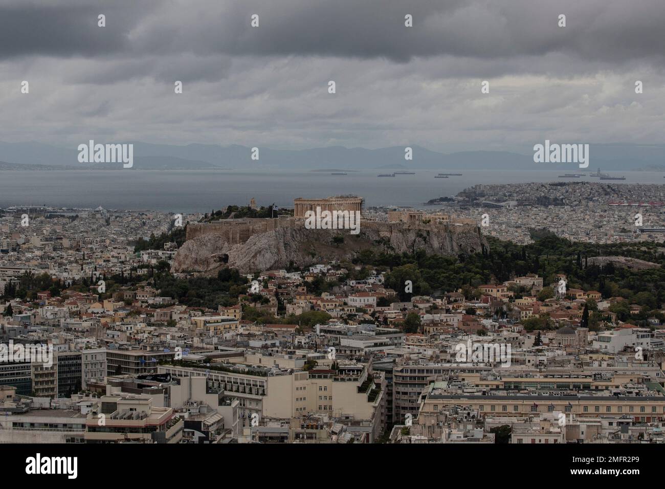The ancient Acropolis hill with a 500 BC Parthenon temple in the city ...