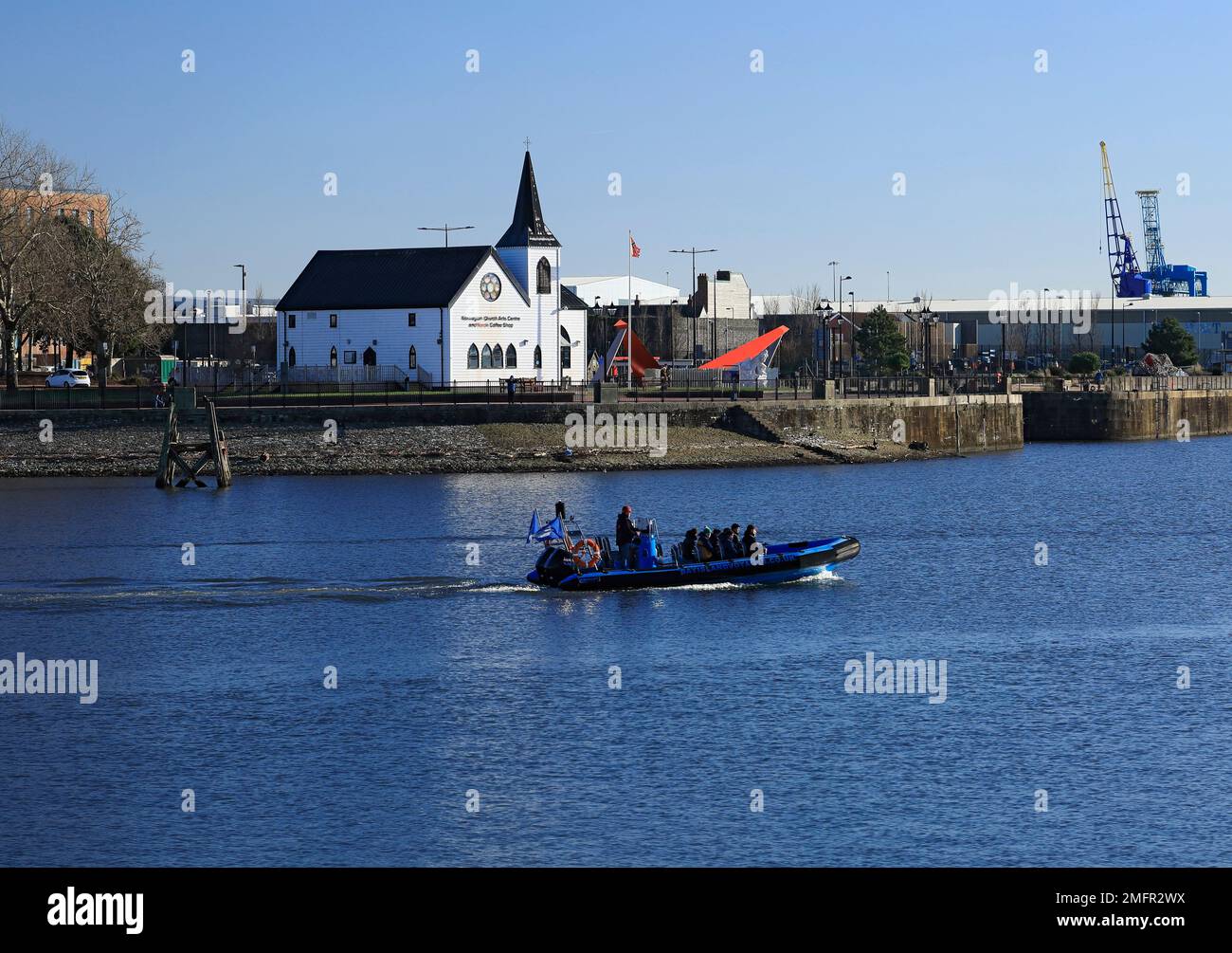 Norwegian Church and speed boat, Cardiff Bay, South Wales Stock Photo ...