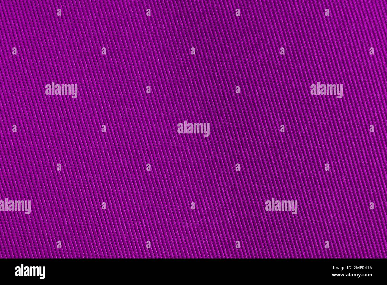 Close up view of purple fabric texture and background. Abstract ...