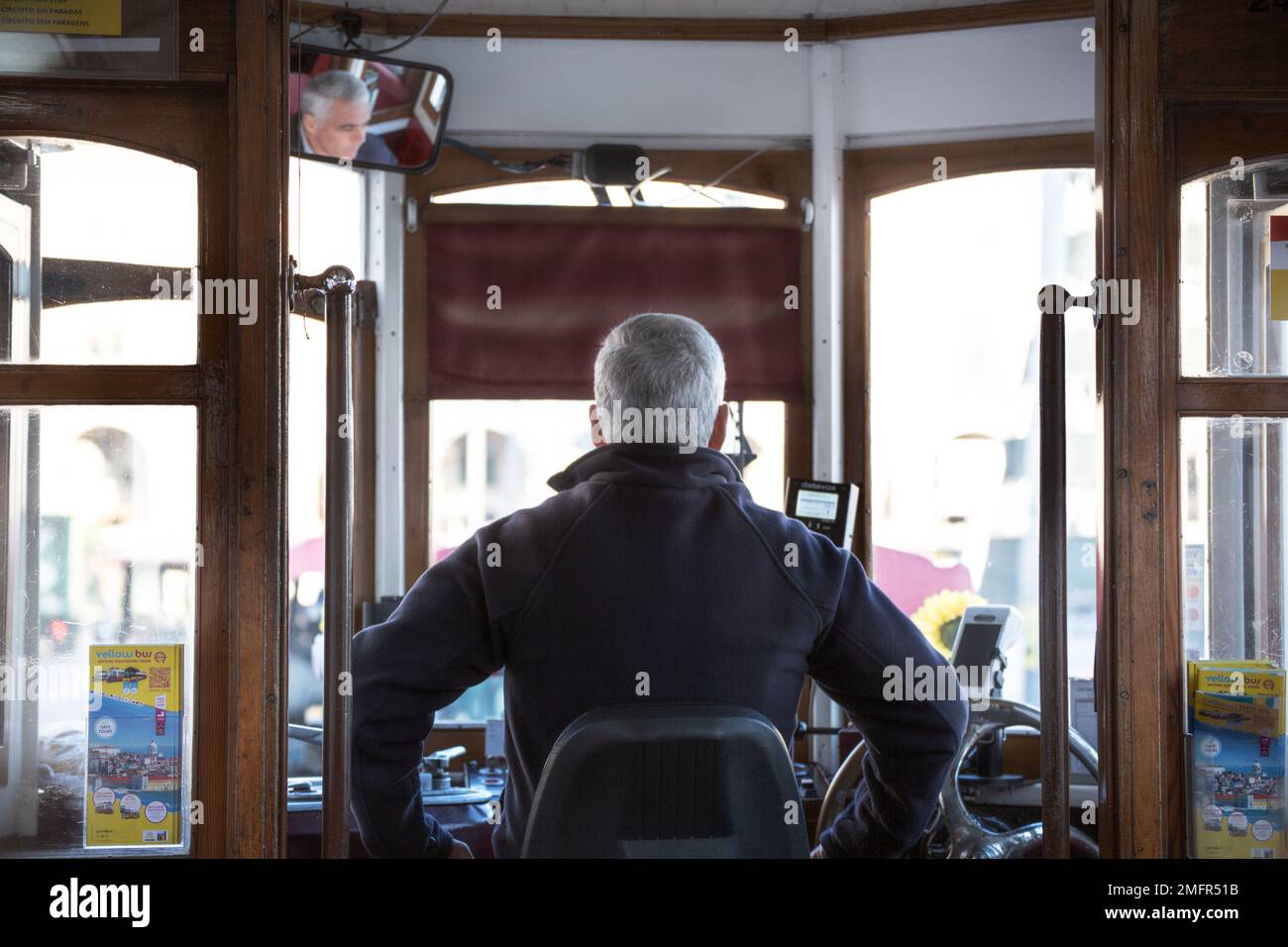 Lisbon historic yellow bus driver Stock Photo - Alamy