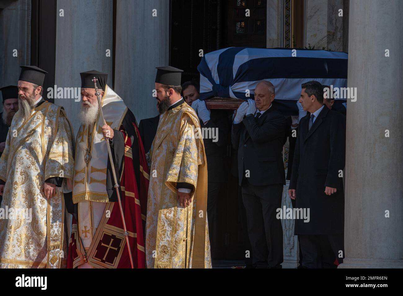 Athens, Greece. 16th January 2023. Pallbeares carry the coffin of the ...