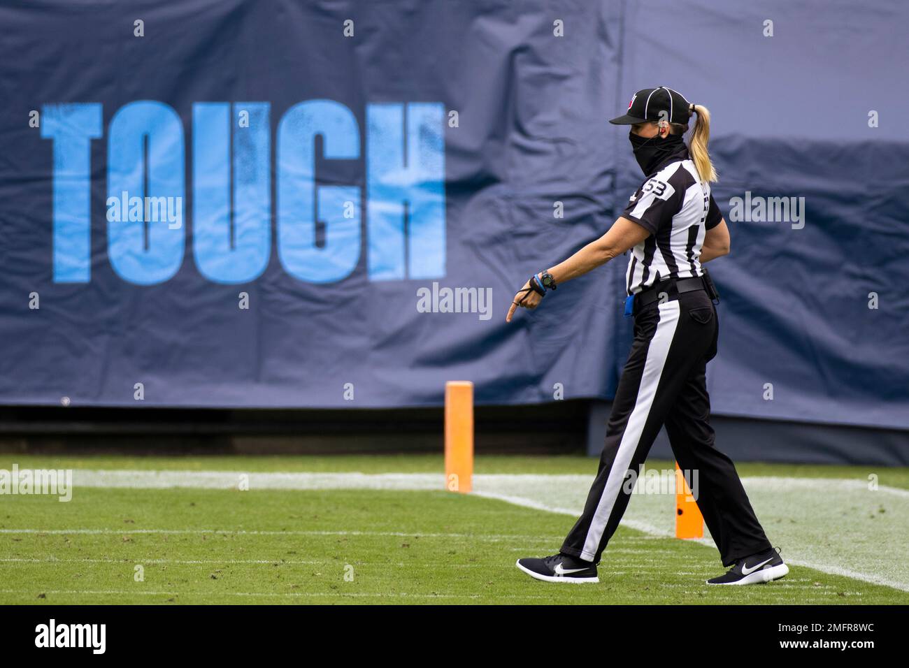 Line judge Sarah Thomas (53) signals a spot of the ball between the ...