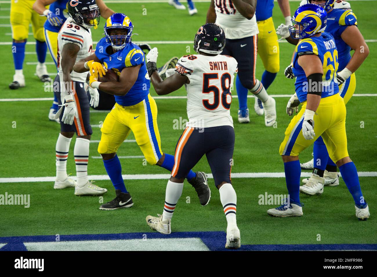 Los Angeles Rams running back Malcolm Brown, left, scores a touchdown ...