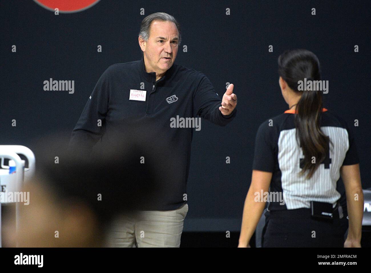Seattle Storm head coach Gary Kloppenburg, left, talks with official ...