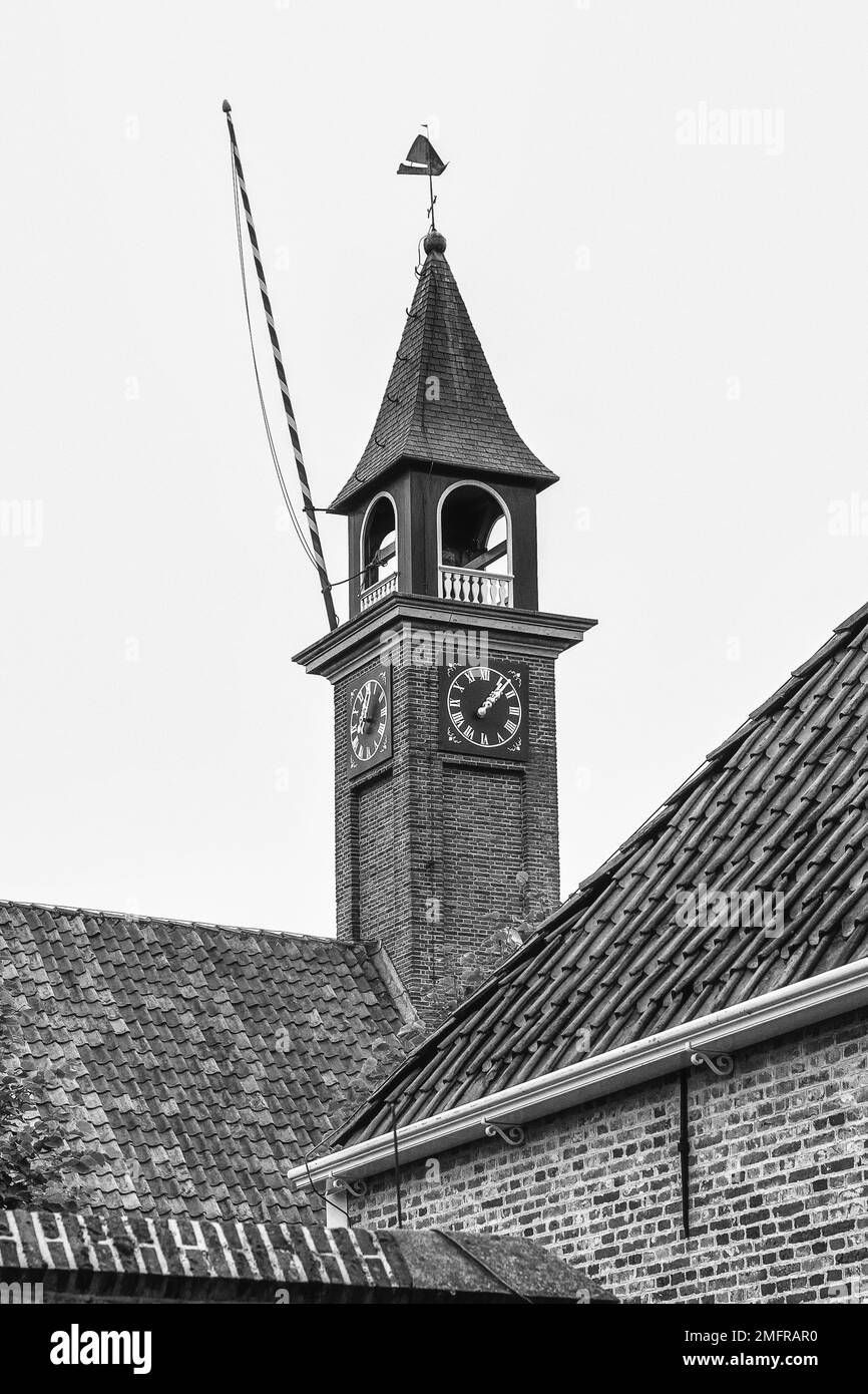 Dome and part of the clock tower of the old church. Black and white ...
