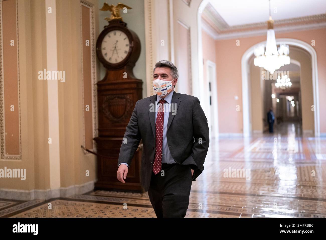 Sen. Cory Gardner, R-Colo., walks to the chamber for a procedural vote ...