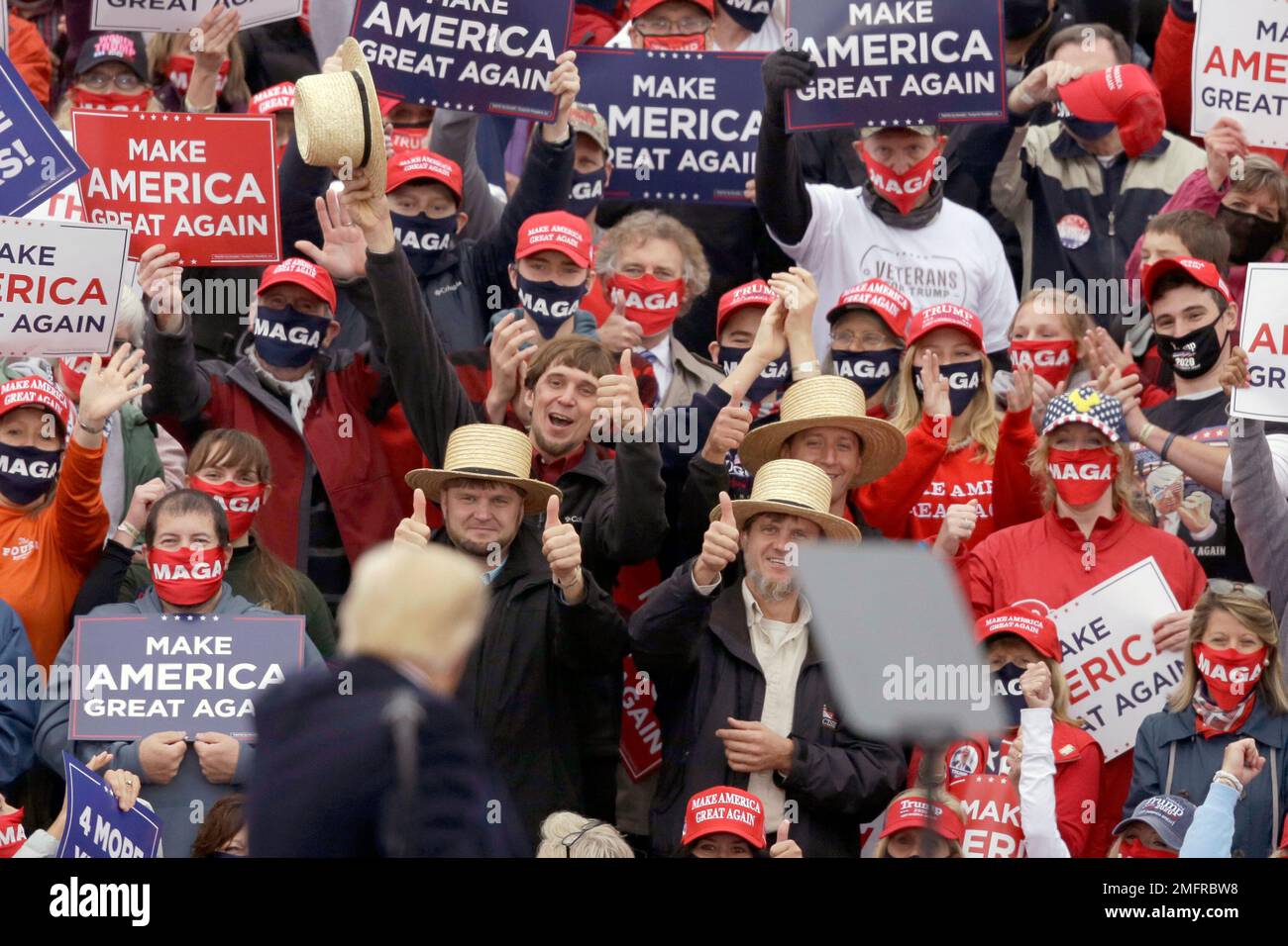 President Donald Trump acknowledges supporters during a campaign rally ...