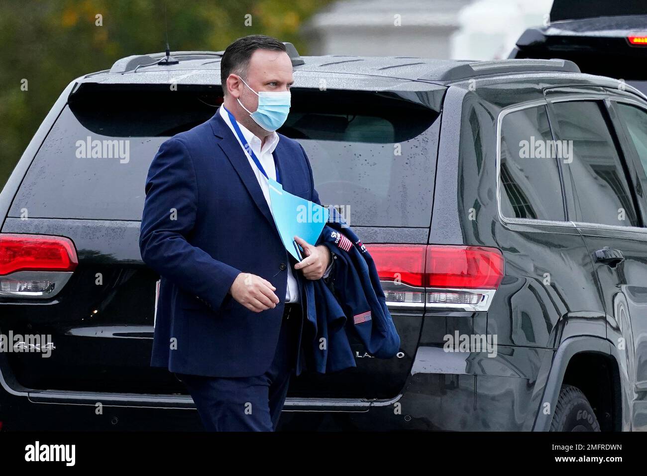 White House Social Media Director Dan Scavino walks to a motorcade ...