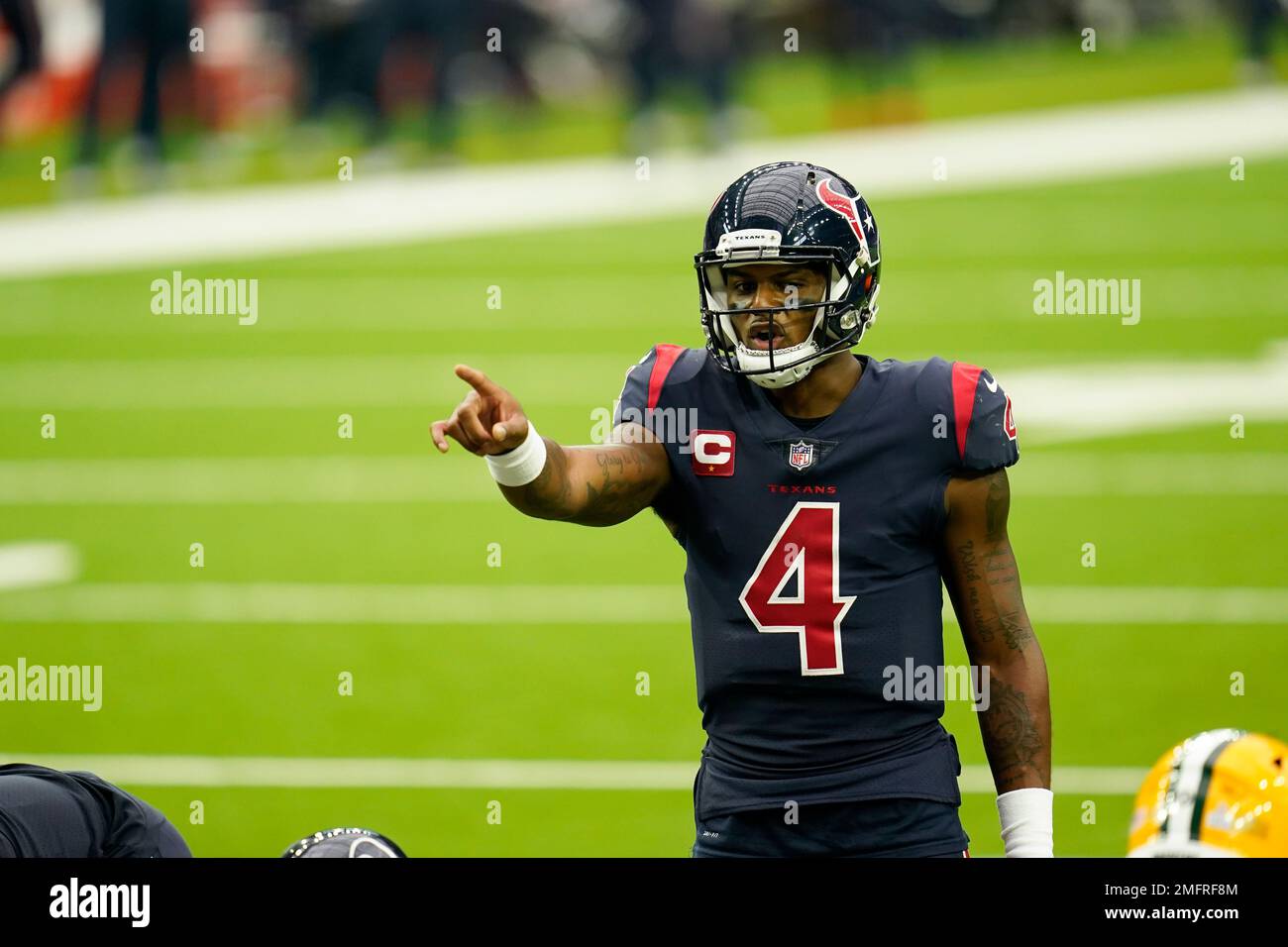 Houston Texans quarterback Deshaun Watson (4) points over the line of ...