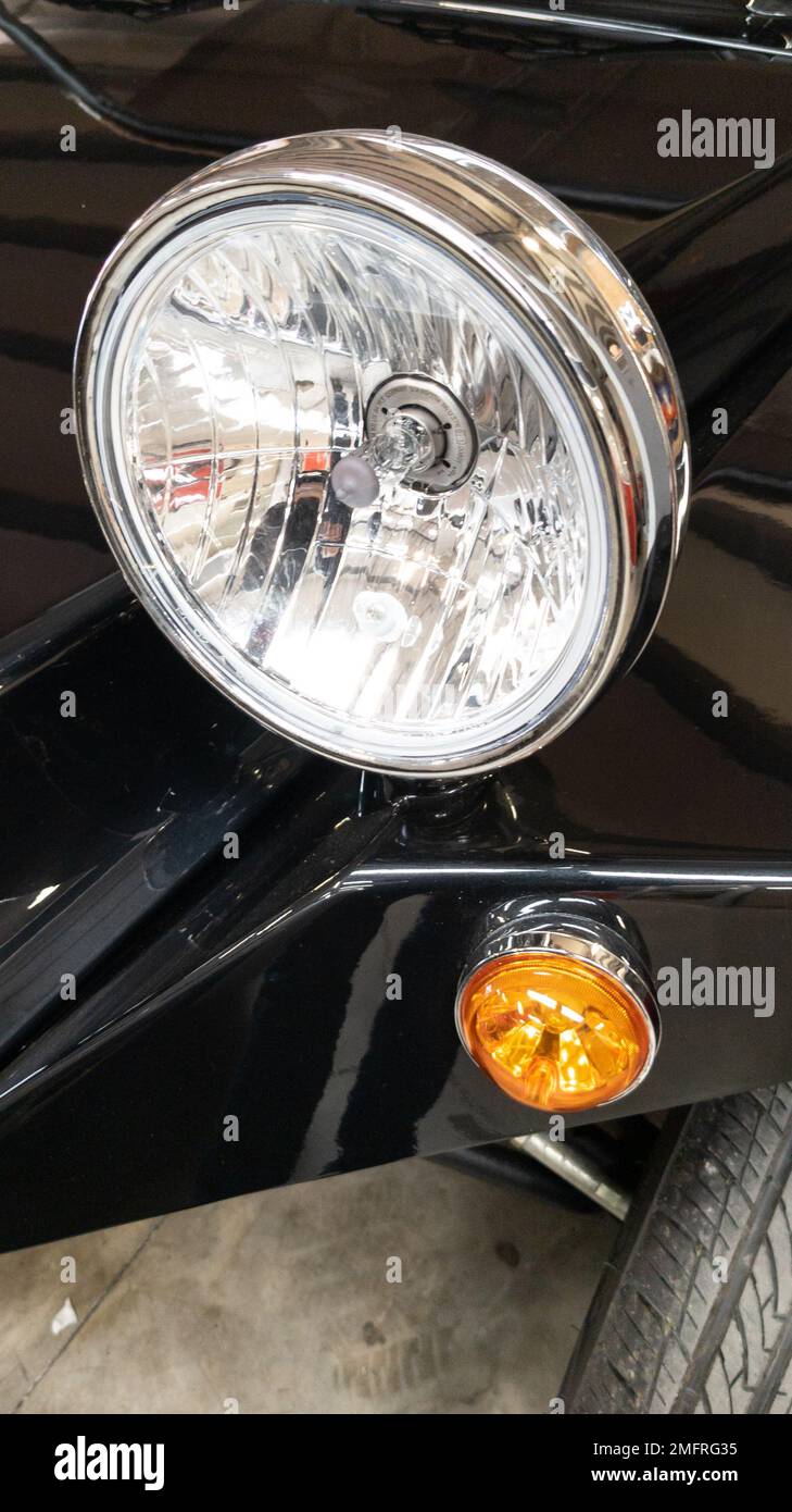 Classic retro car headlight of black vintage vehicle Stock Photo - Alamy