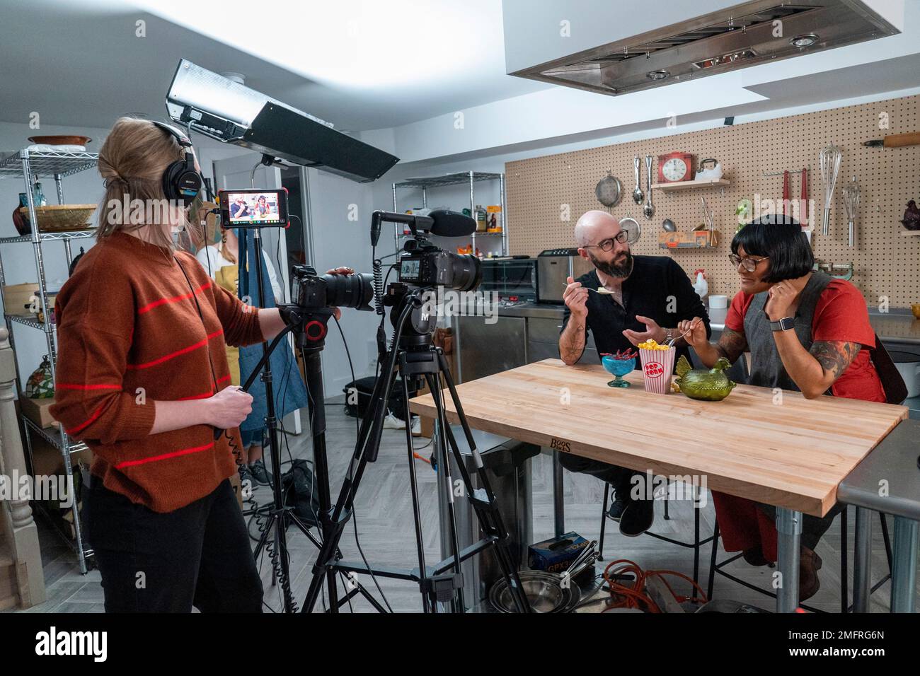 In this Oct. 7, 2020 photo, producer Jessica Opon, left, films Andrew ...