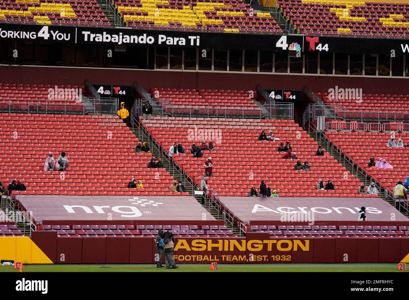 Fans are spread out in the lower bowl of FedEx Field during the first ...