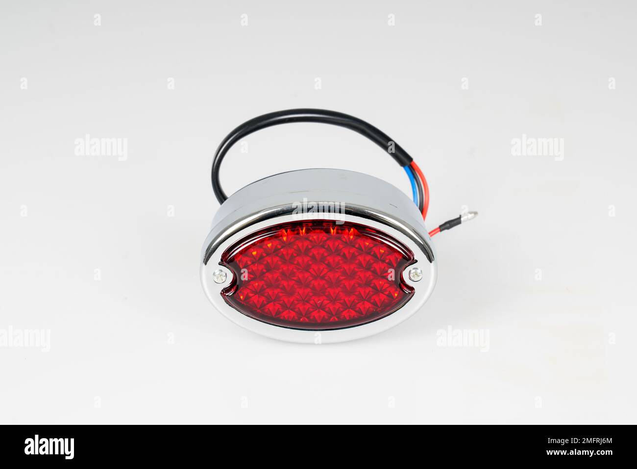 vintage retro motorcycle rear red small brake light chrome of a classic ...
