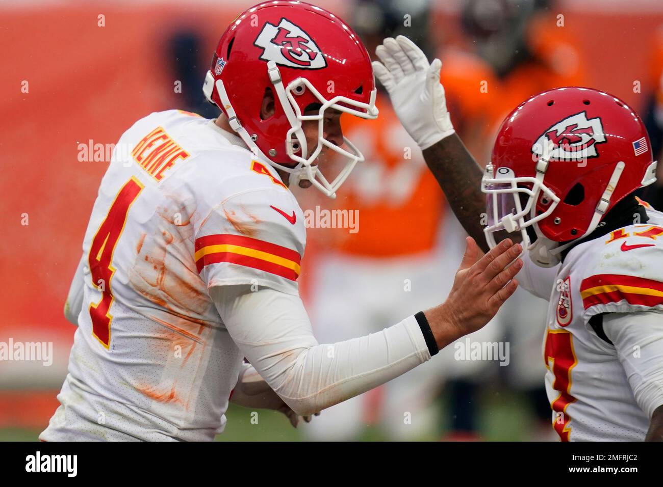 Kansas City Chiefs quarterback Chad Henne reacts after scoring a ...