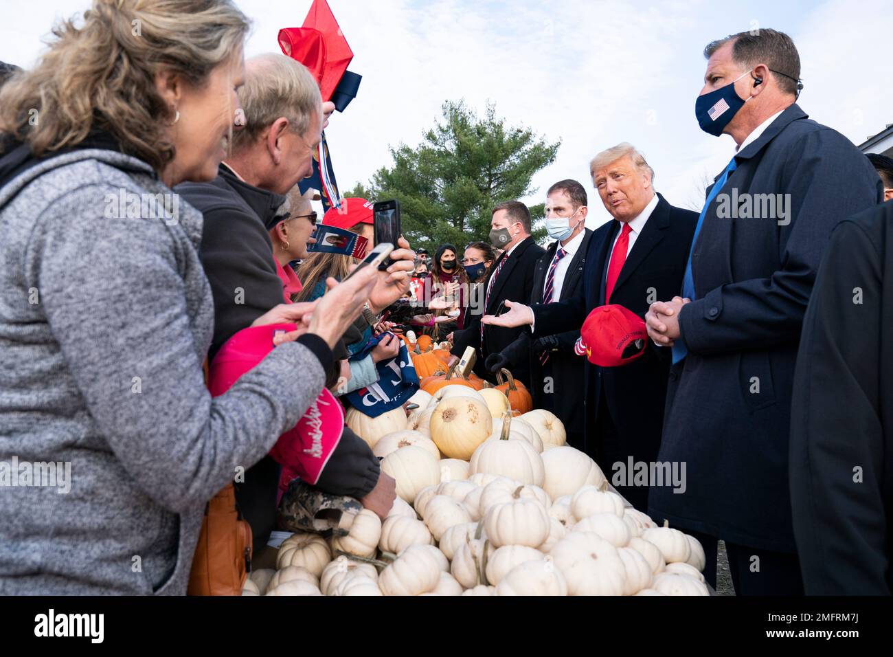 President Donald Trump visits the Treworgy Family Orchards, Sunday, Oct ...