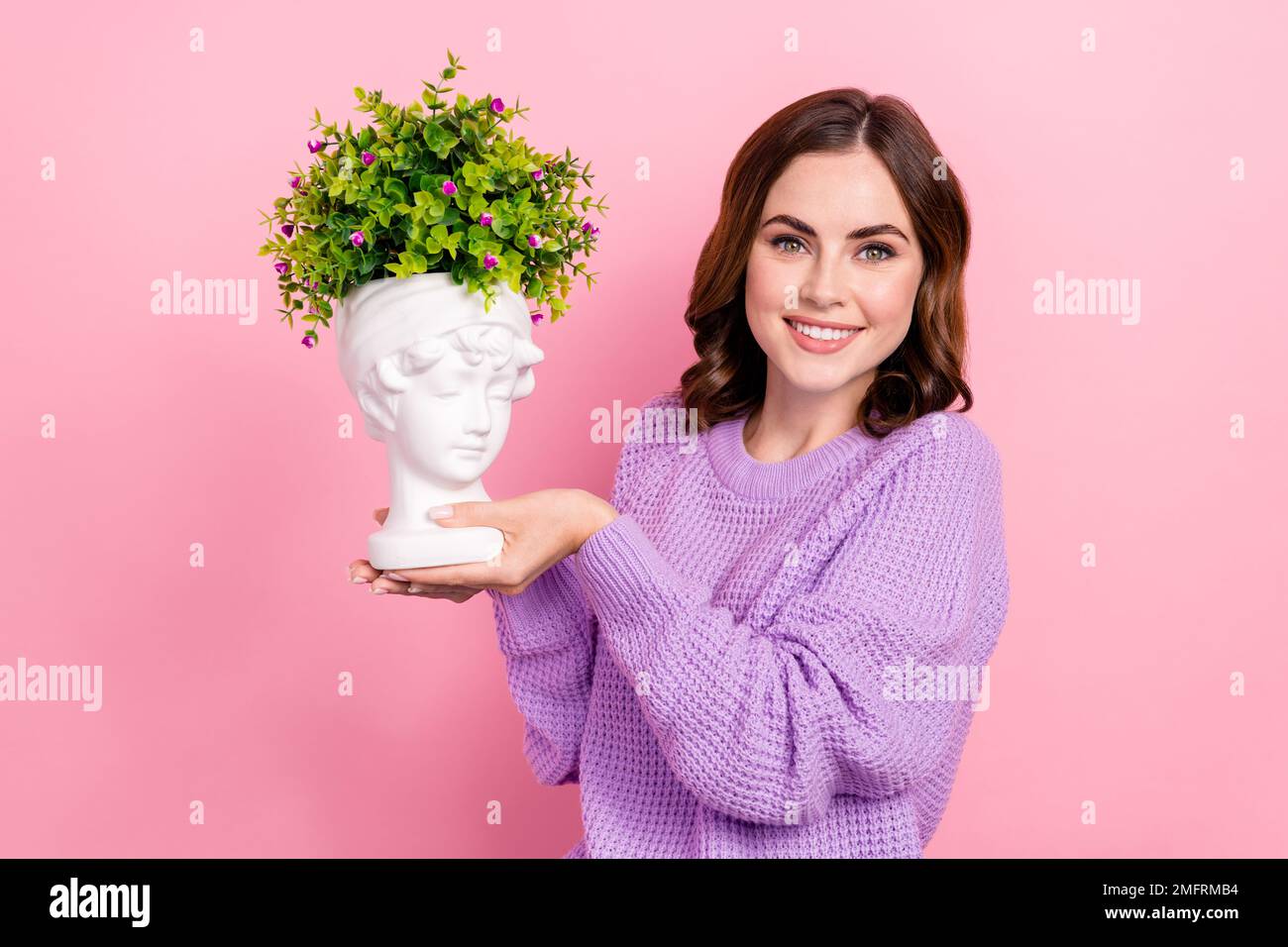 Photo of cheerful excited girl dressed purple pullover showing arms ...