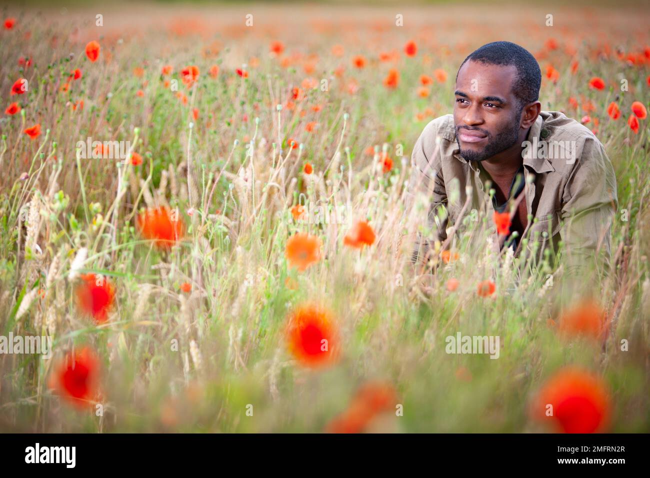 Rural Fashion, Field of Dreams. A calm look on the face of a handsome ...