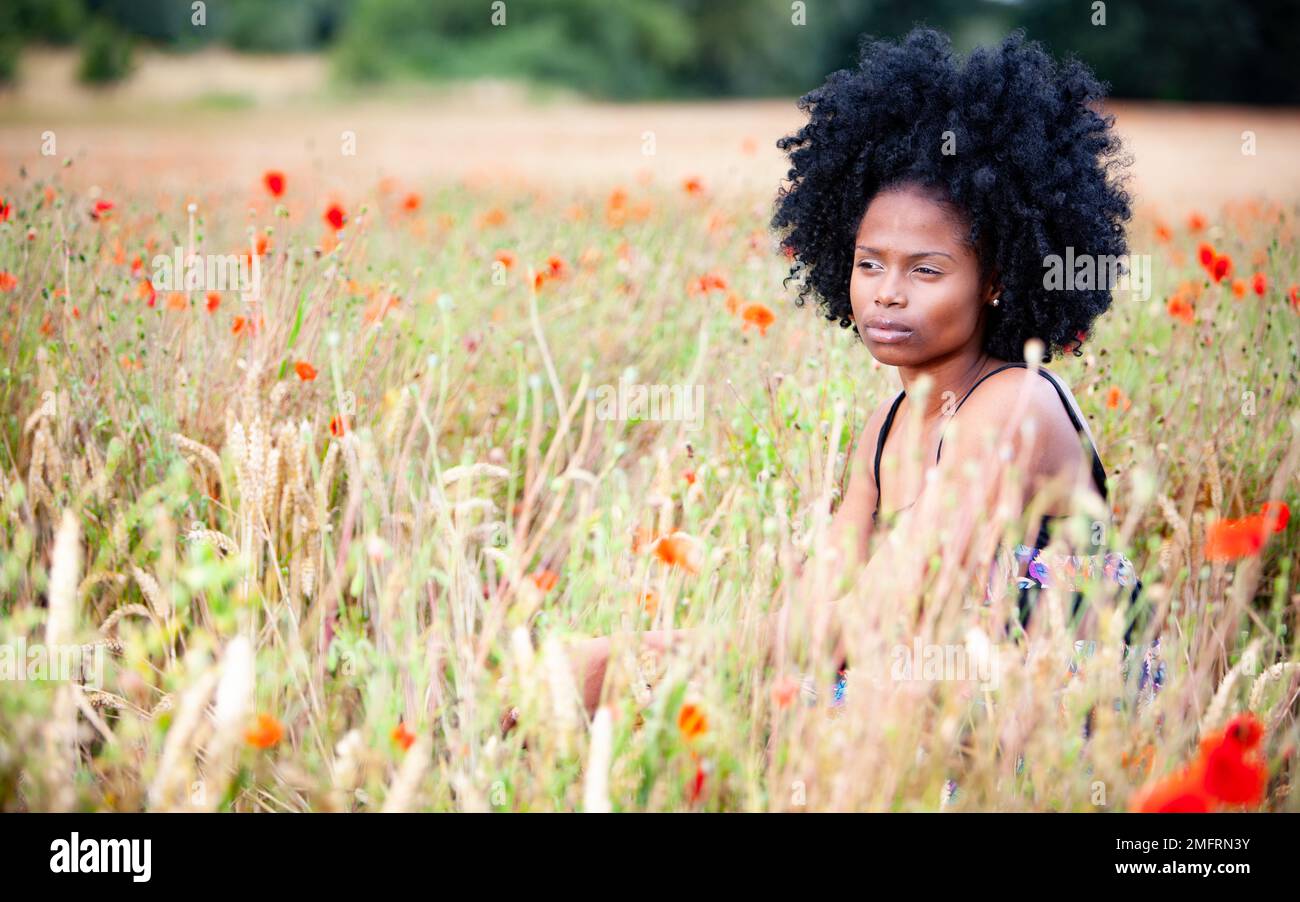 Rural Fashion, Rustic Retreat. A young woman alone with her thoughts in ...