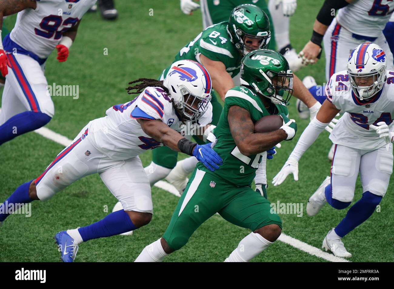 New York Jets' La'Mical Perine runs the ball for a touchdown during the ...
