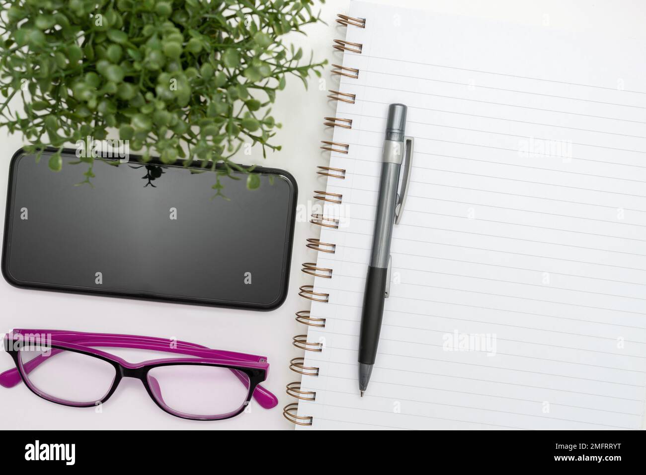 Notebook With Important Messages On Desk With Coffee, Phone And Glasses ...