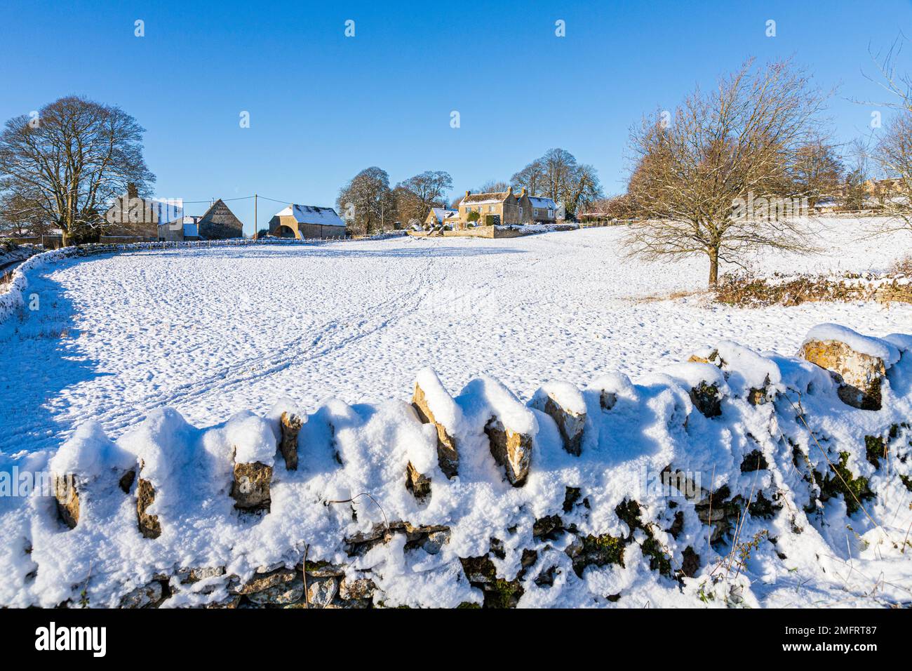 Early winter snow at the Cotswold village of Winstone, Gloucestershire ...