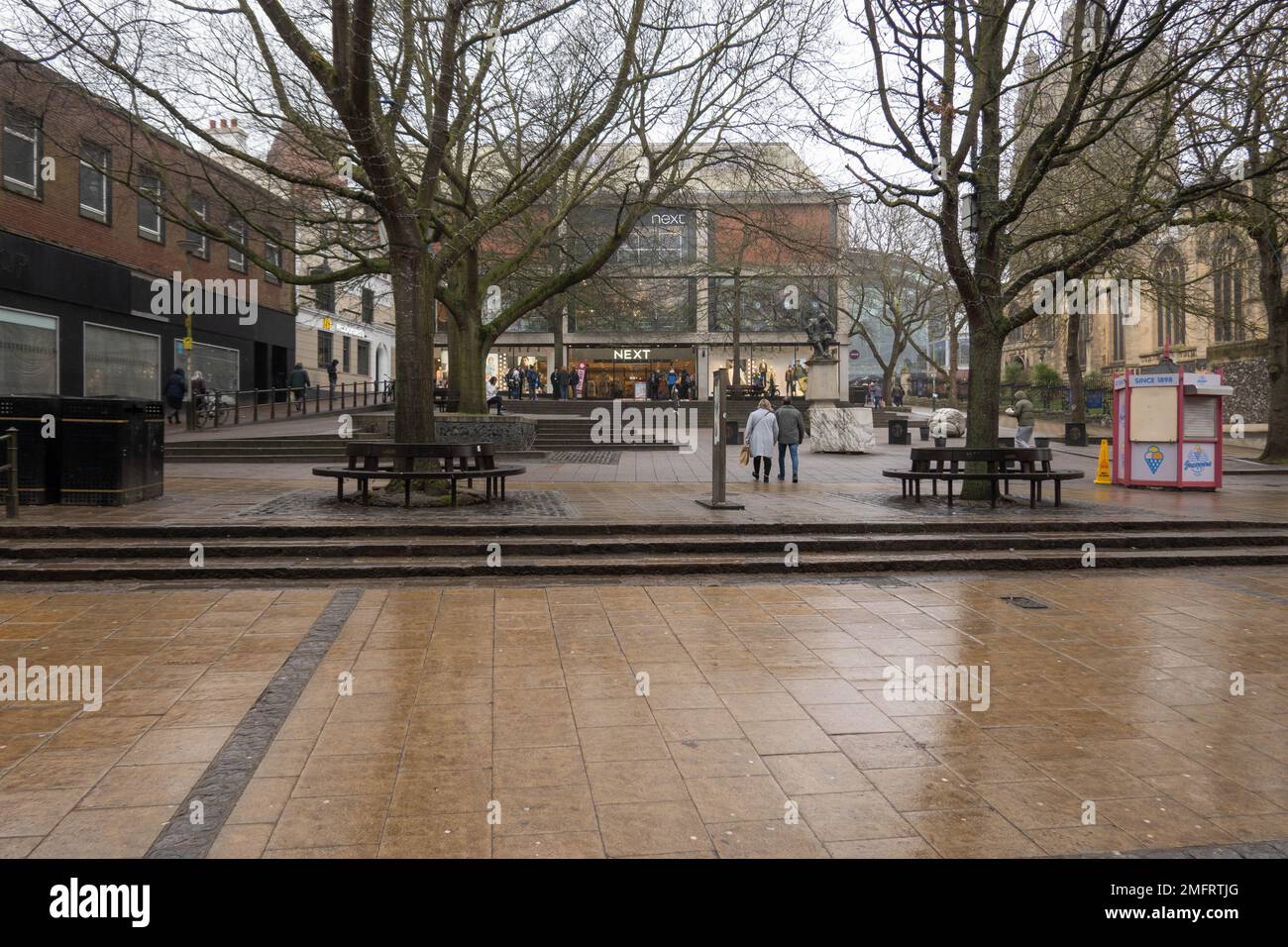 A view of Next store in Haymarket Norwich in winter with shoppers ...
