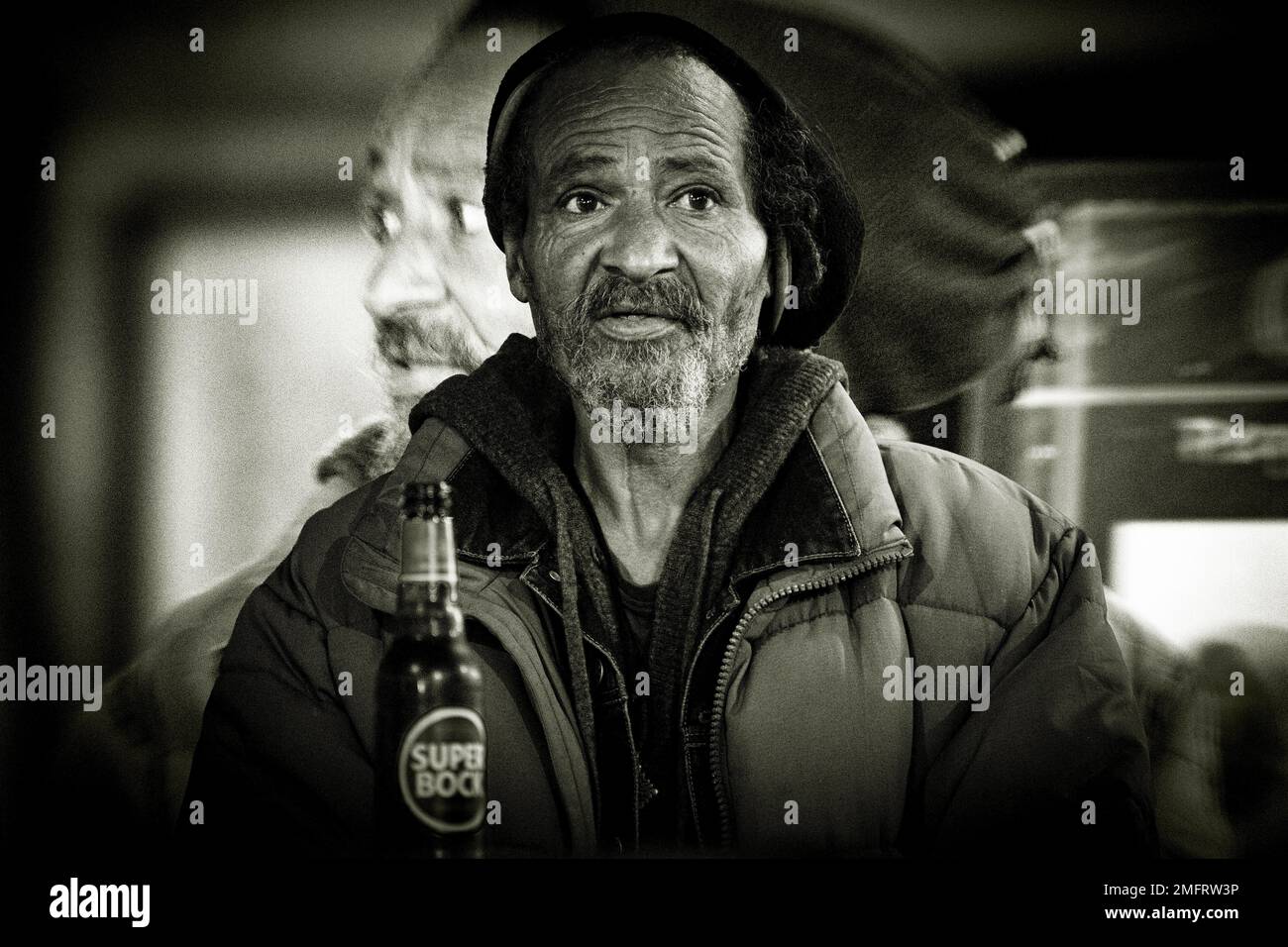 Rastafarian man with beer Stock Photo - Alamy