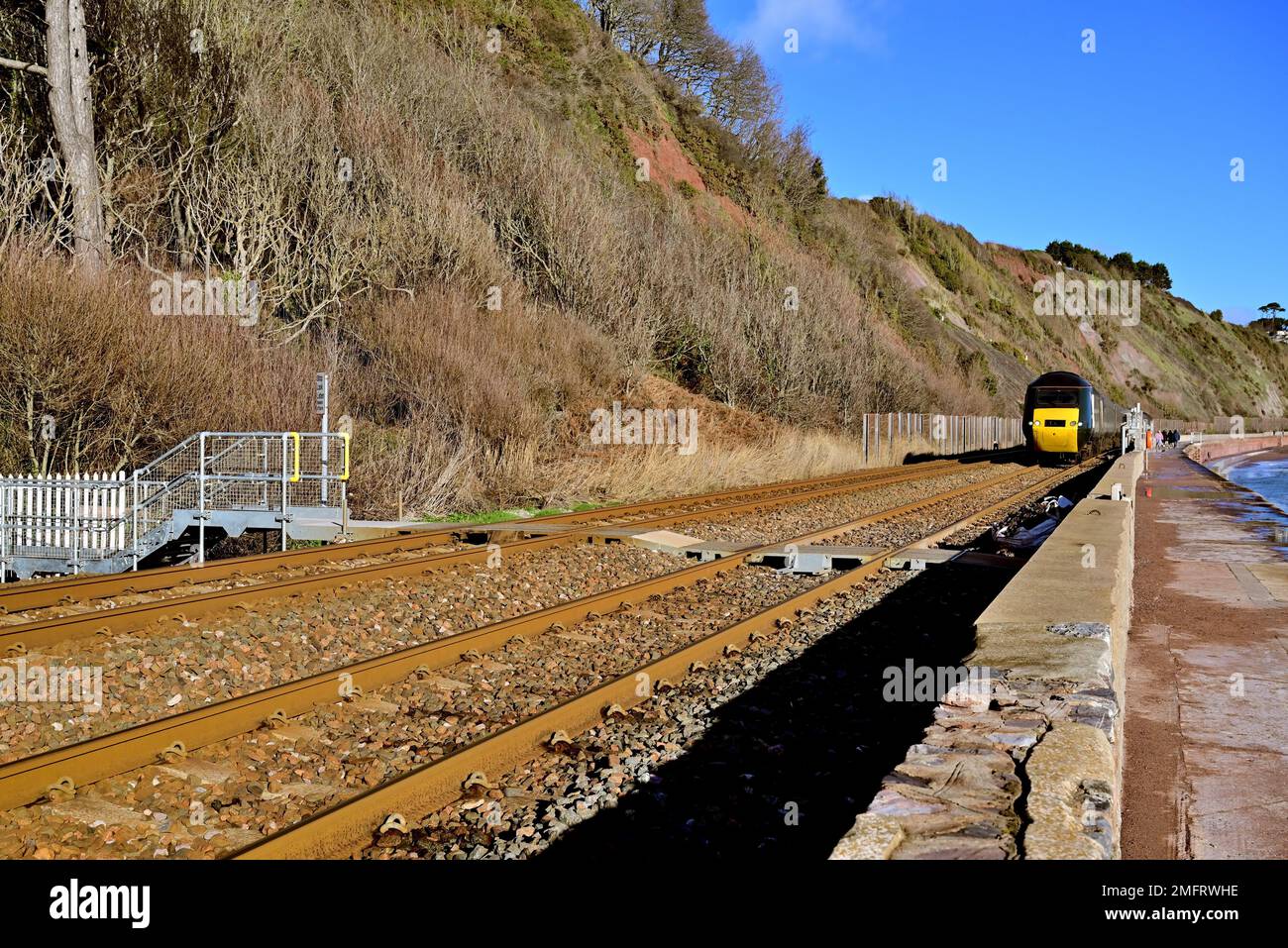 An Intercity125 high speed train travelling along the seawall at ...