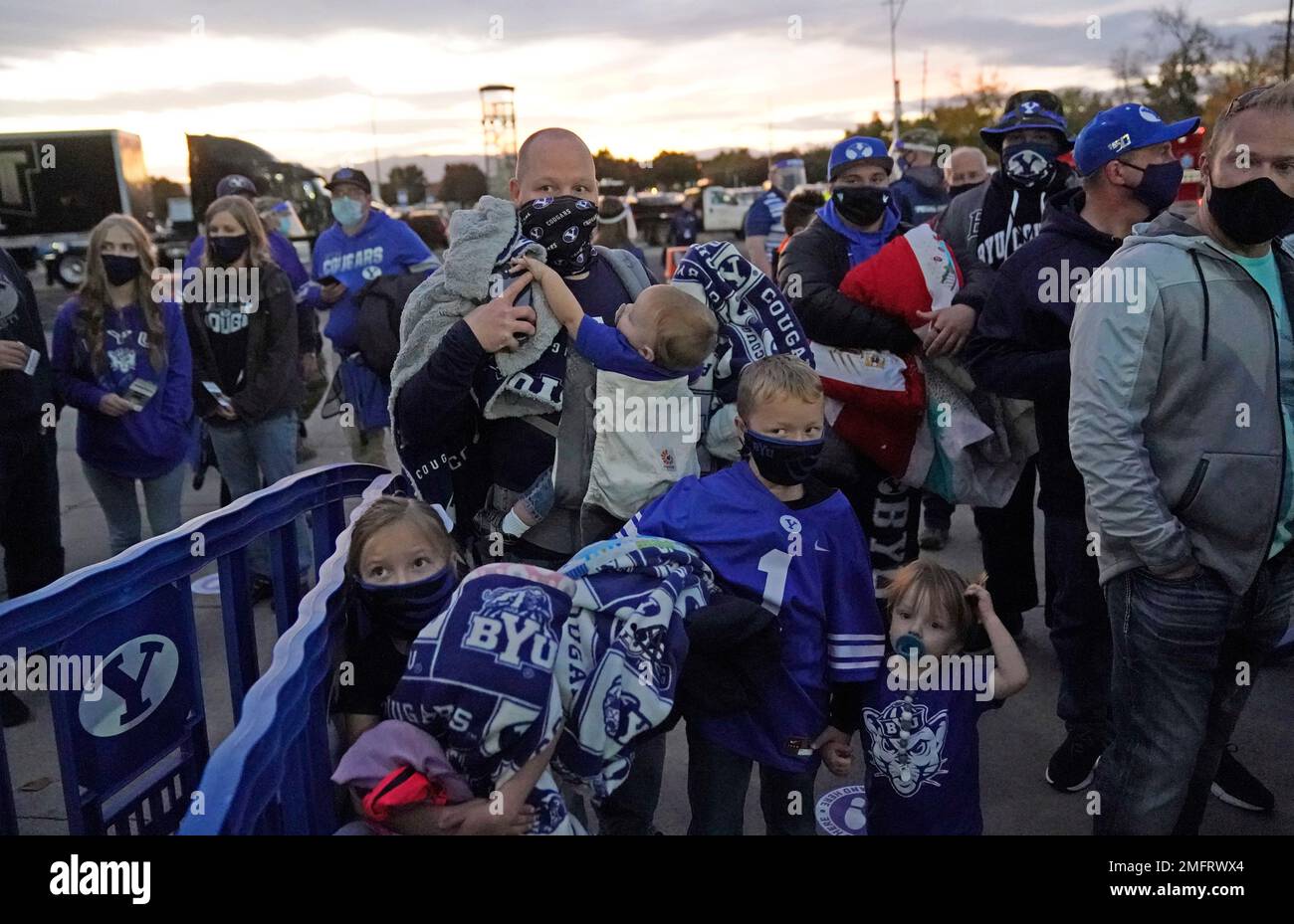 BYU fans go through security before entering LaVell Edwards Stadium for ...