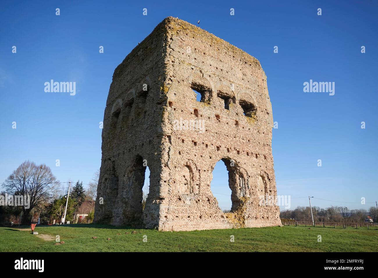 A scenic shot of the Temple of Janus under the blue sky in Autun ...
