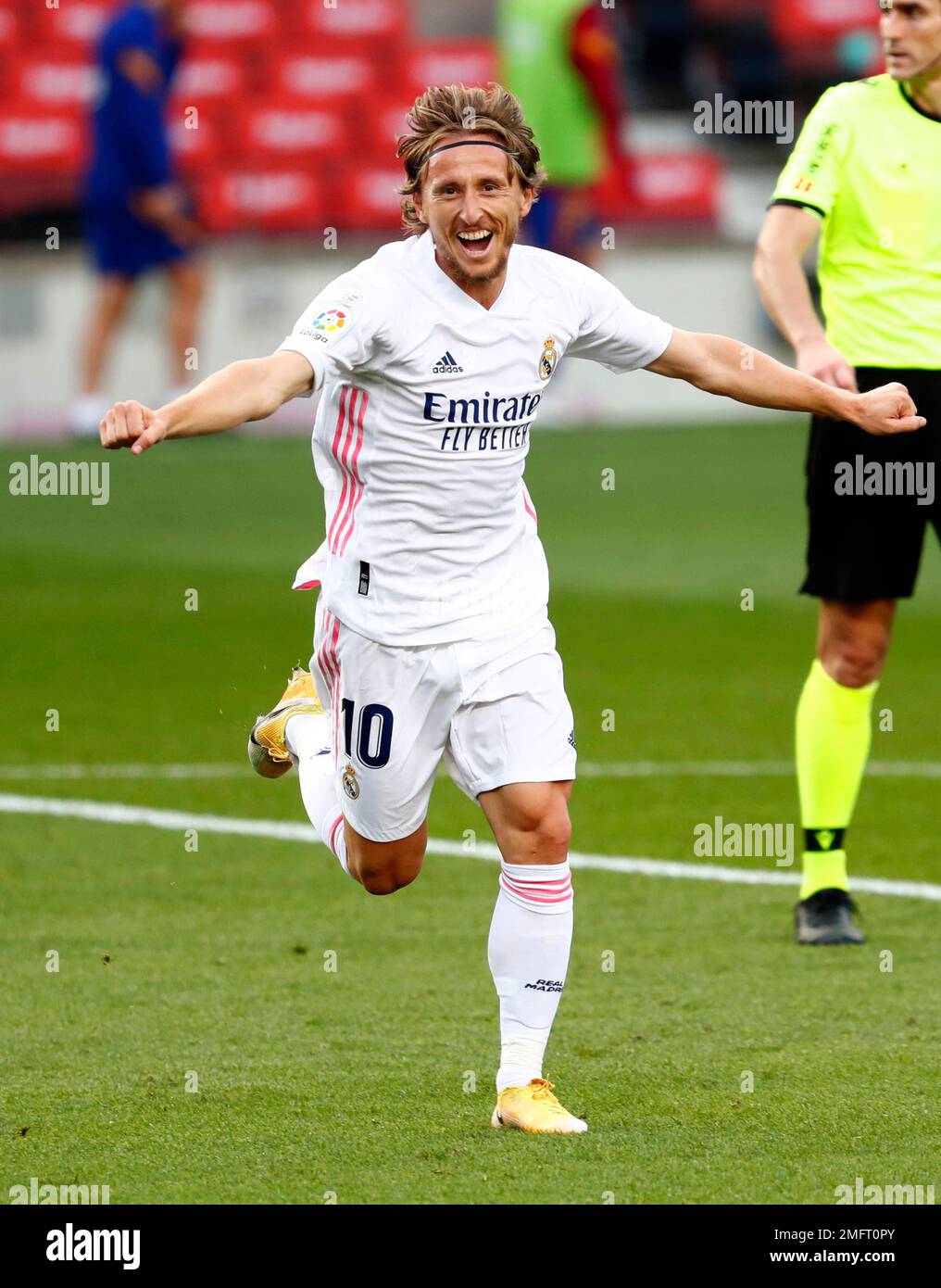 Real Madrid's Luka Modric celebrates scoring his side's 3rd goal during ...