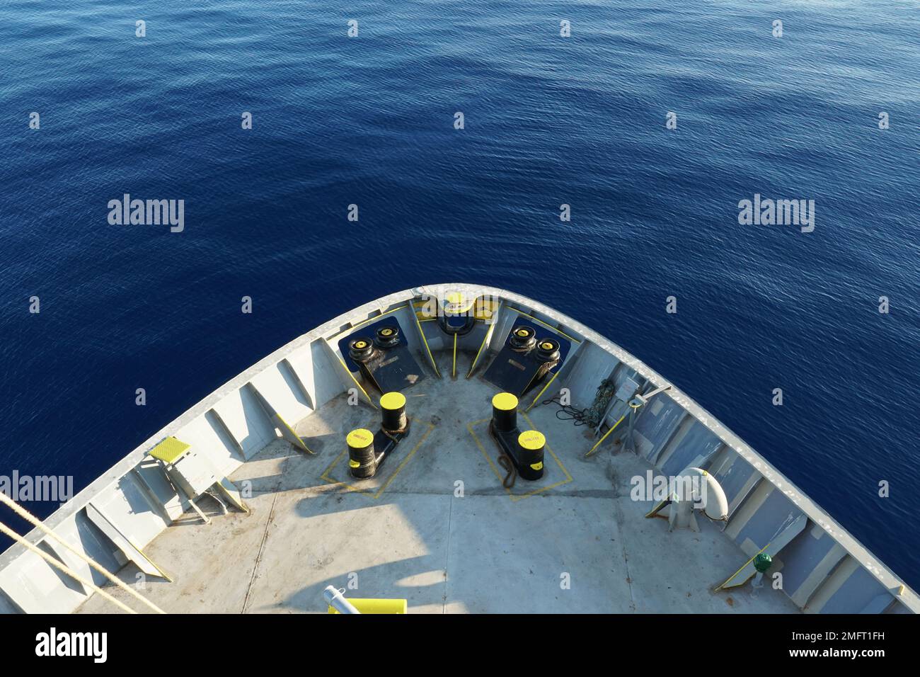 View on calm blue Mediterranean Sea and mooring station with yellow ...