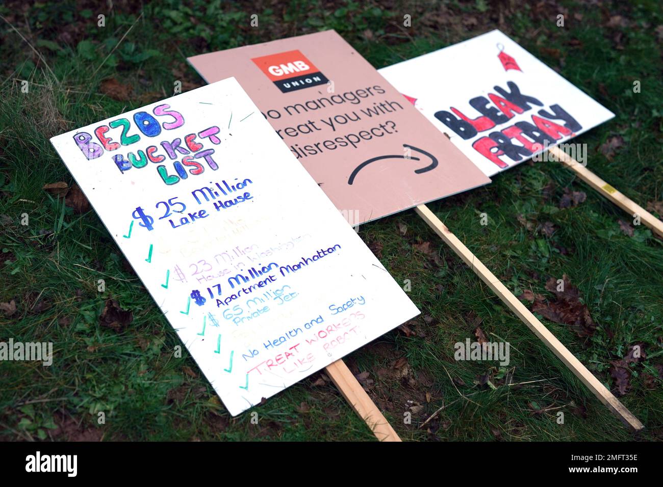 Signs used by members of the GMB union during a rally outside the ...