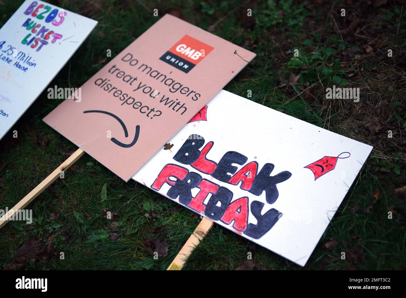 Signs used by members of the GMB union during a rally outside the ...