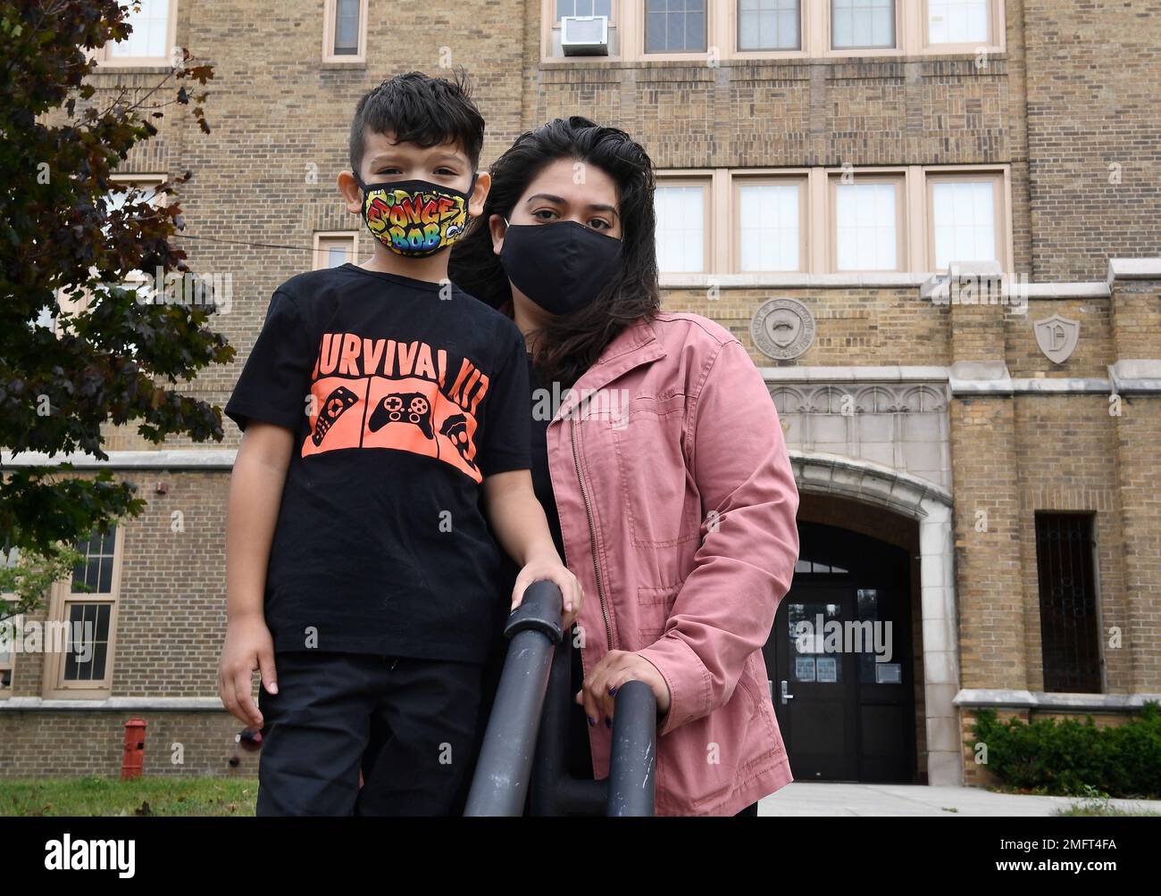 Kristina Negron poses for a photograph with her son, Mason Negron, 6 ...