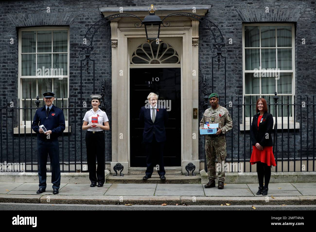 British Prime Minister Boris Johnson poses for photographs with, from ...