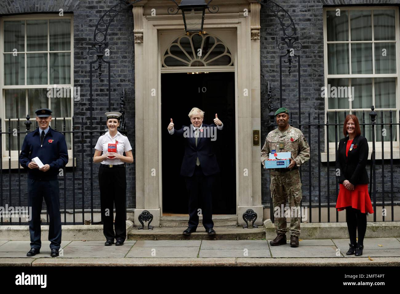 British Prime Minister Boris Johnson poses for photographs with, from ...