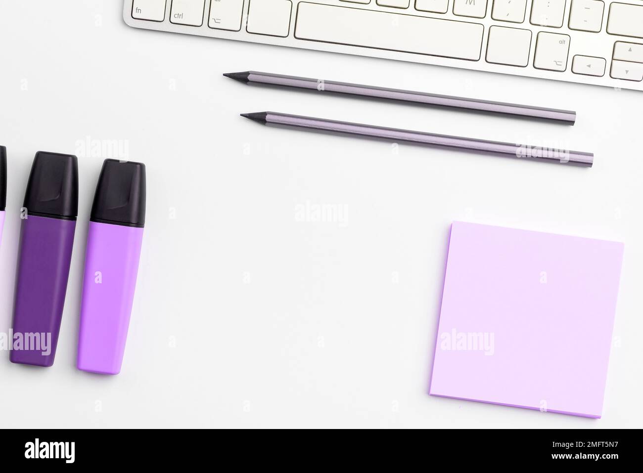 Colored paper with important message lying desk near keyboard. Main ...