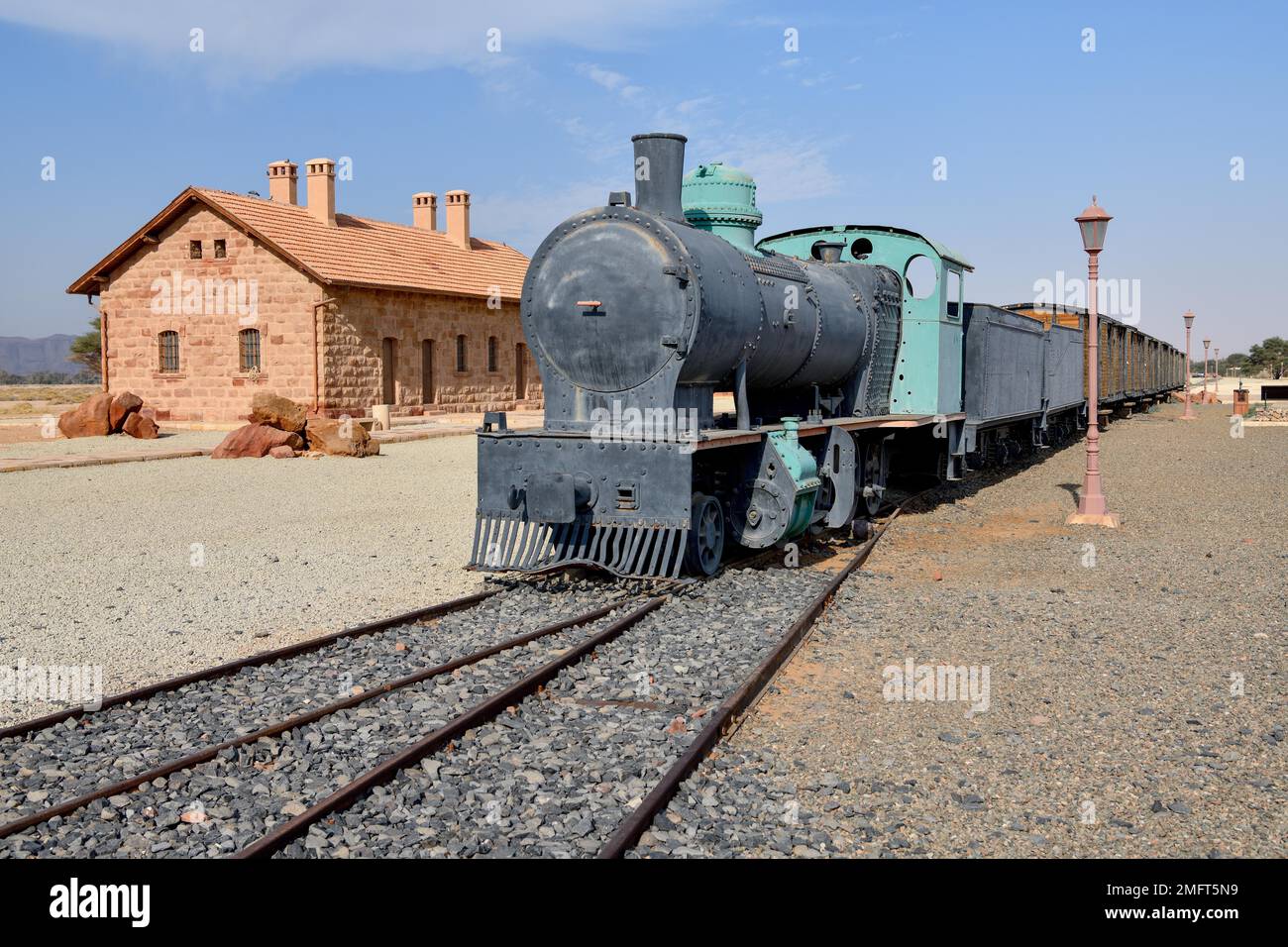 Historic train of the Hejaz Railway in the renovated station of Hegra ...
