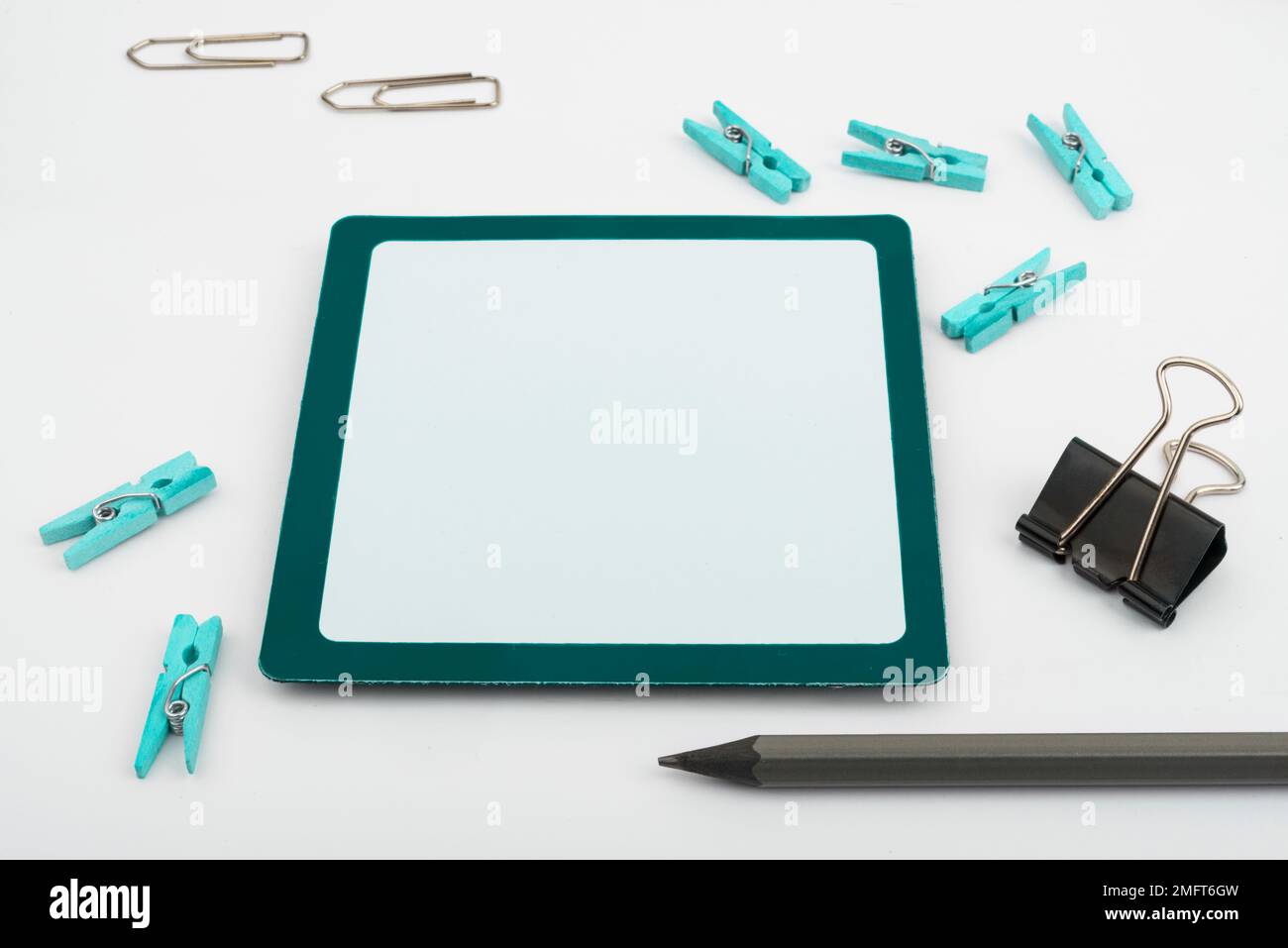 Important Messages. Sticker Lying On White Desk With Clotherspins ...