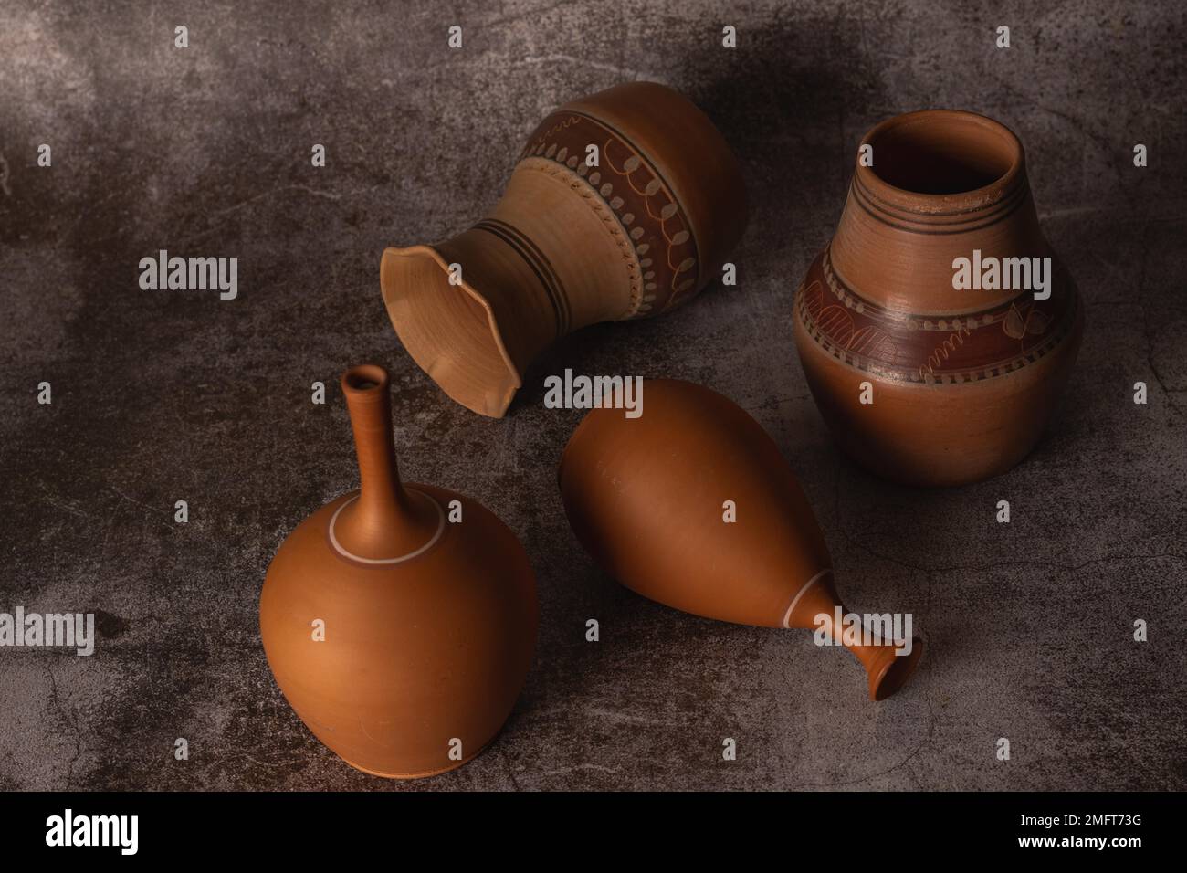 Handmade pottery pots made by a potter in isolation Stock Photo - Alamy