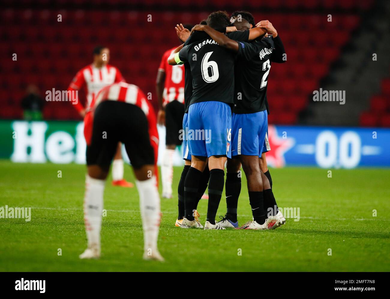 Granada players celebrate their 2-1 win during the Group E Europa ...