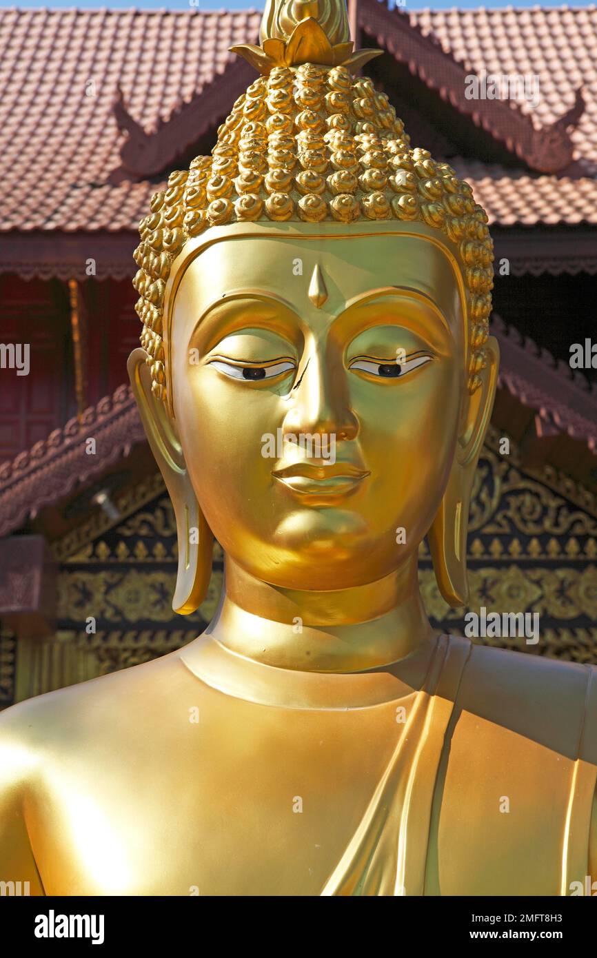 Golden Buddha figure in front of Wat Phra Bat Ming Muang, Phrae, Phrae ...