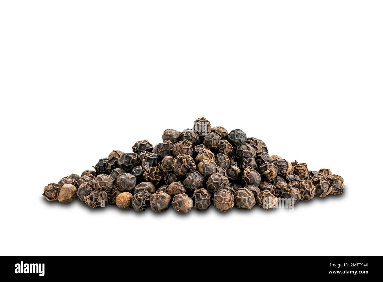 Closeup view pile of natural black pepper seeds on white background ...