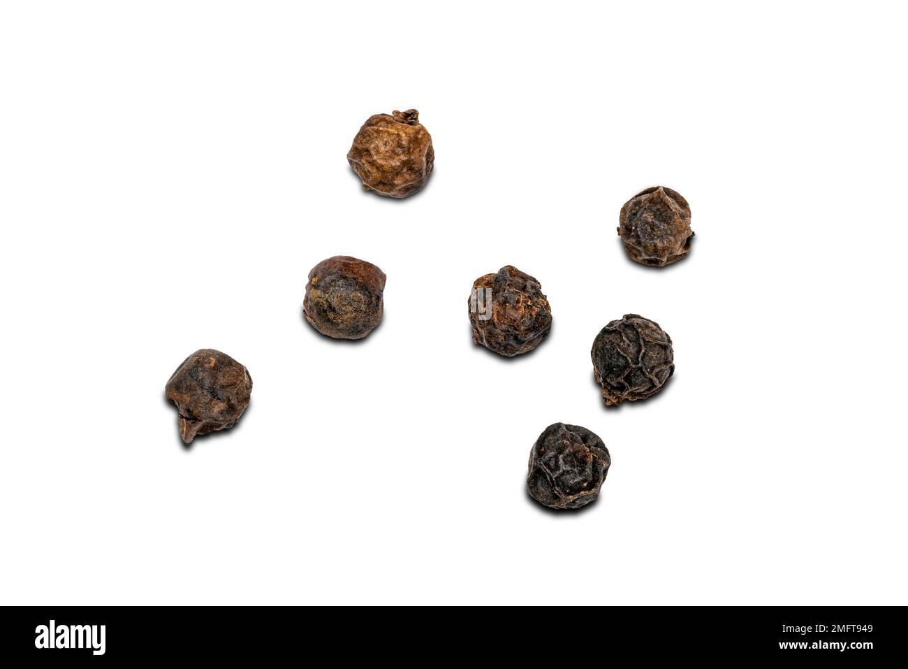 Top view of dried natural black pepper (Piper nigrum) seeds on white ...